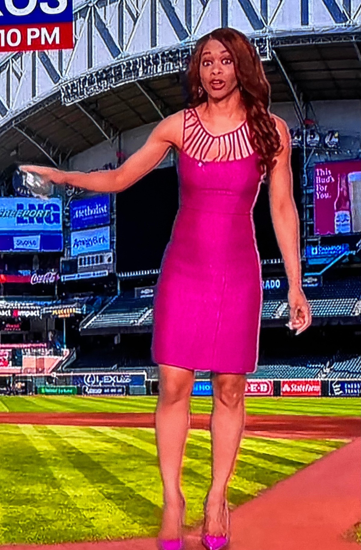 Female meteorologist in slinky outfits